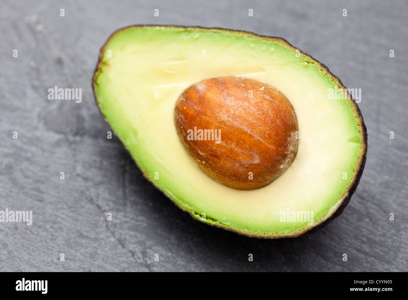Half of avocado hi-res stock photography and images - Alamy