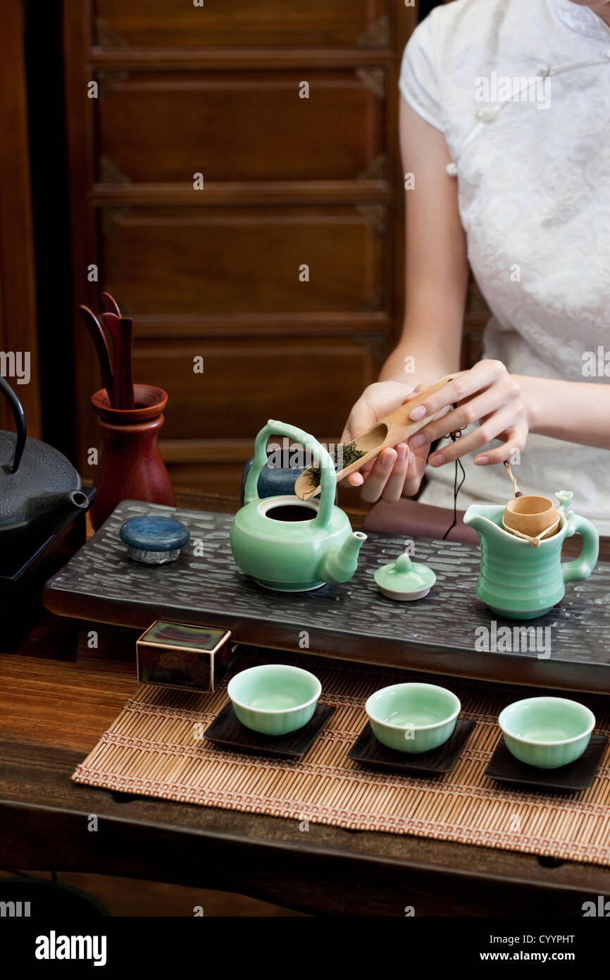Young woman performing tea ceremony Stock Photo - Alamy