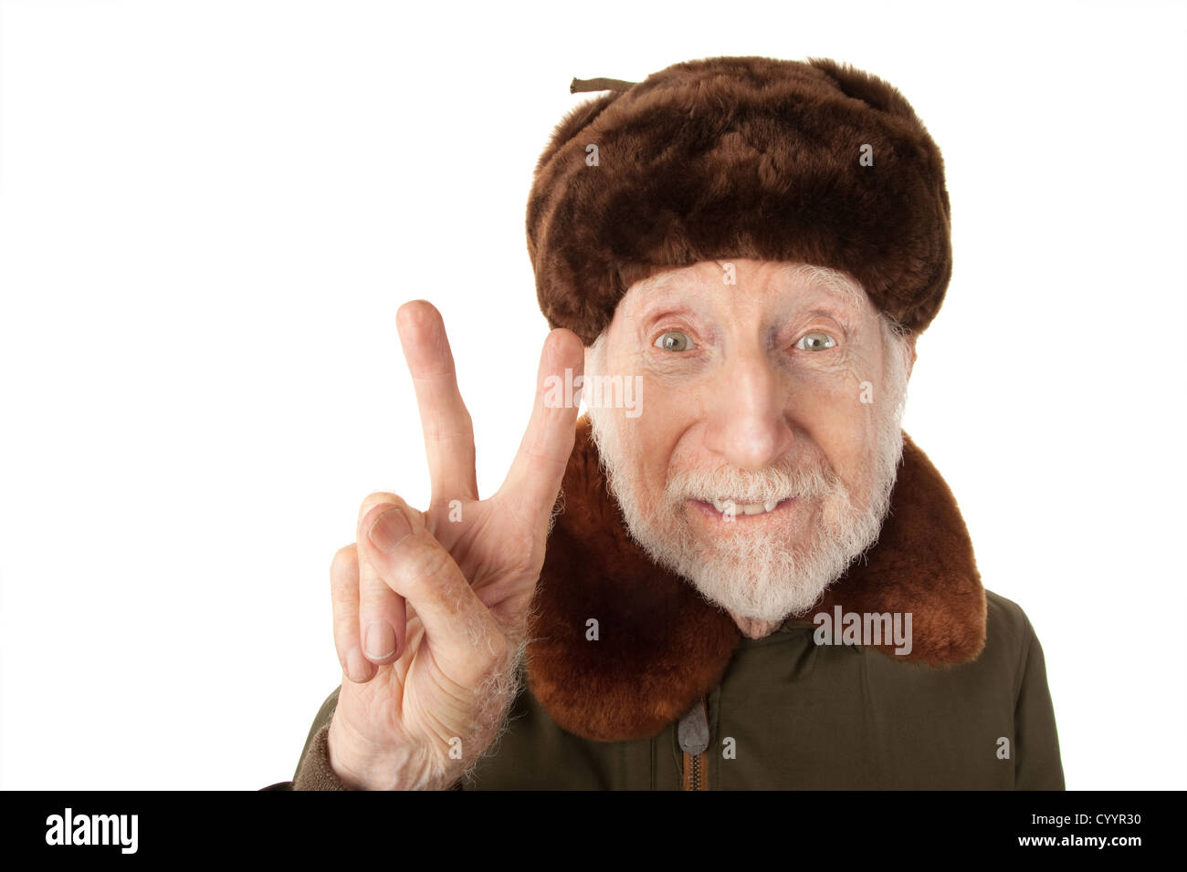 Senior Russian Man in Fur Cap and Jacket Making Peace Sign Stock Photo ...