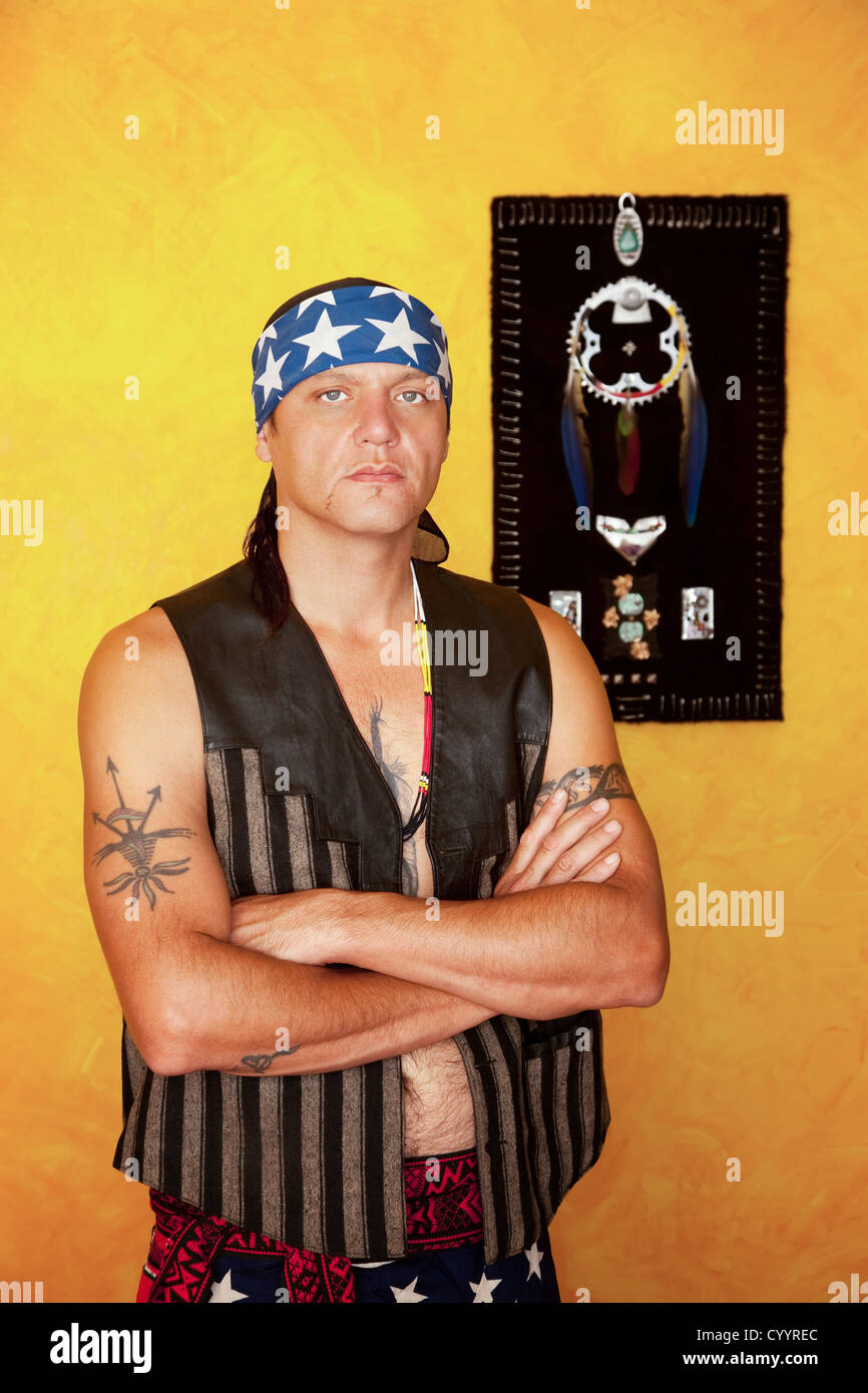 Handsome Native American man with his personal artwork Stock Photo - Alamy