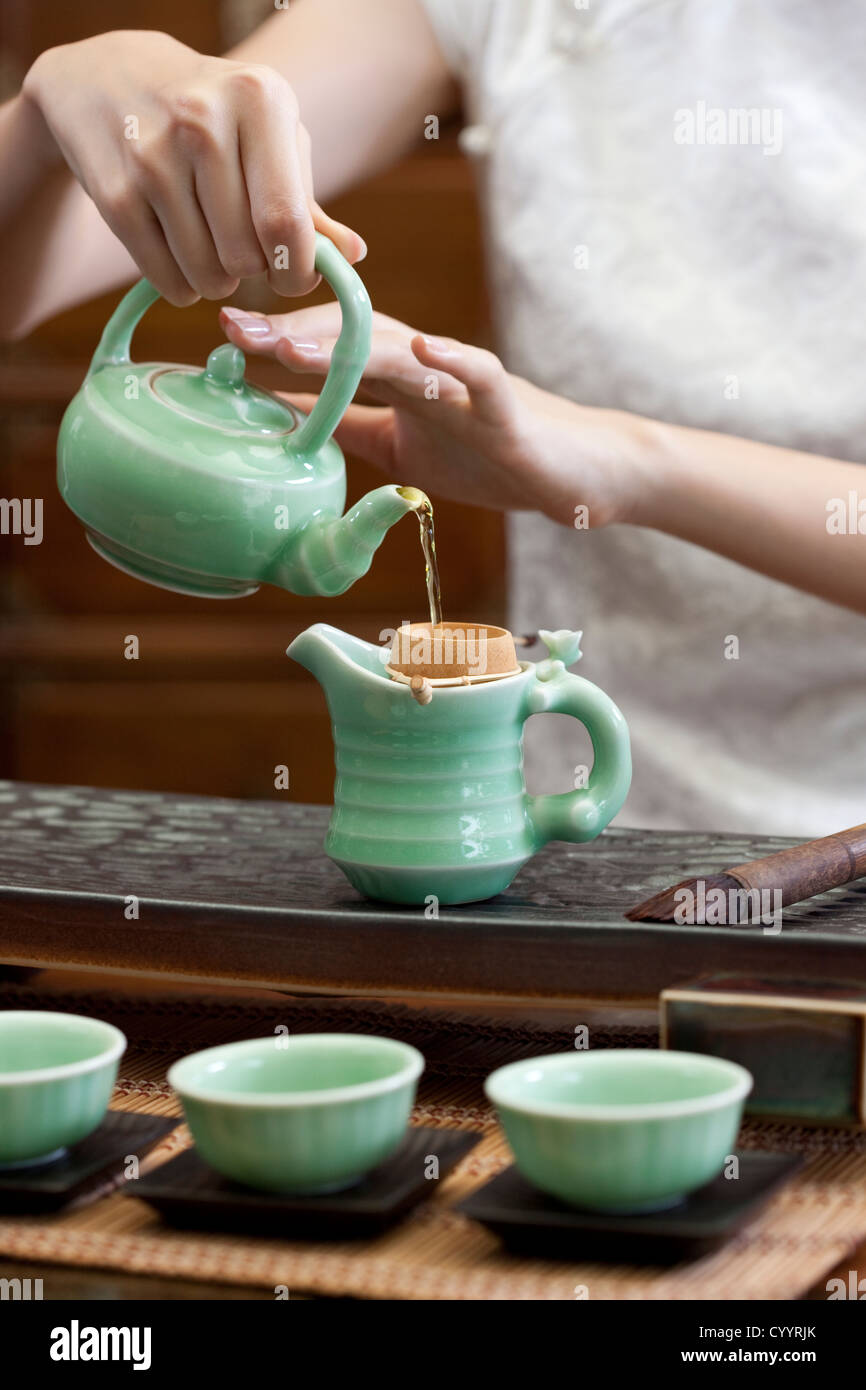 Young woman performing tea ceremony Stock Photo - Alamy