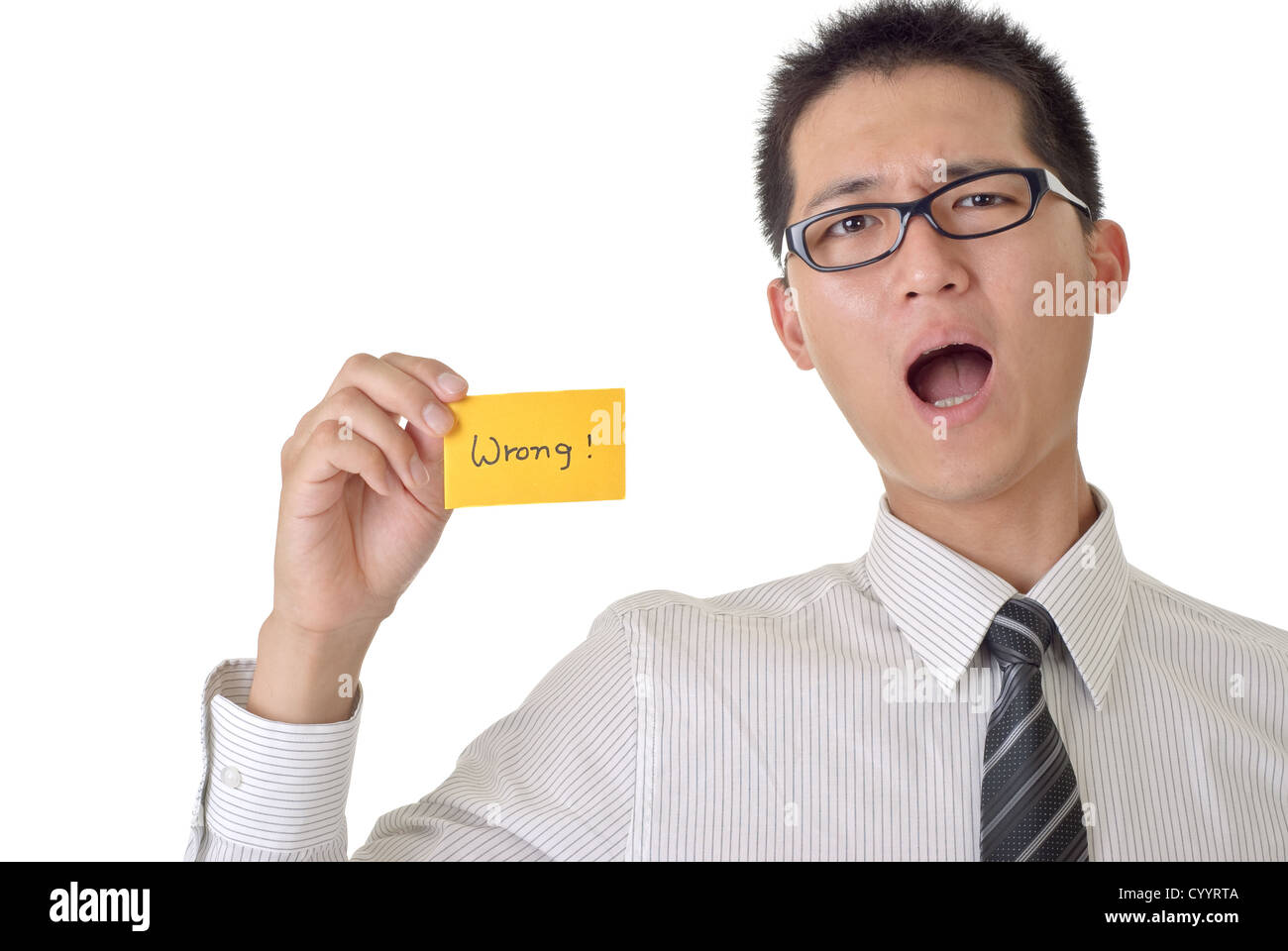 Asian business man show wrong word on yellow card Stock Photo - Alamy