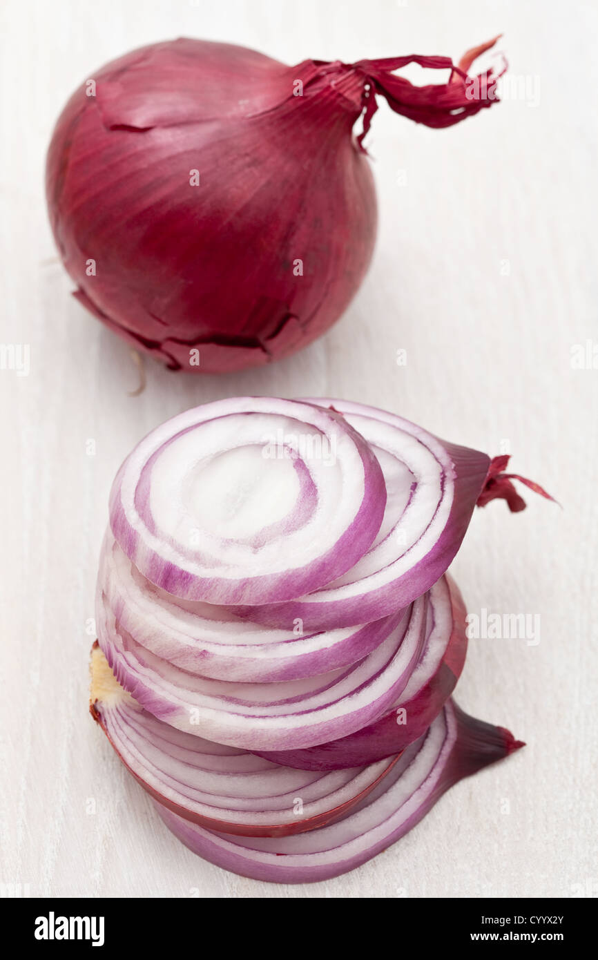 Chopped red onion on a white board Stock Photo - Alamy