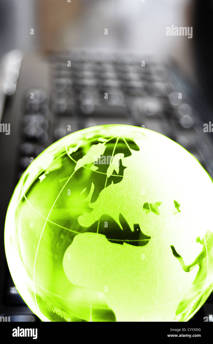 globe and keyboard showing global communication or internet concept ...
