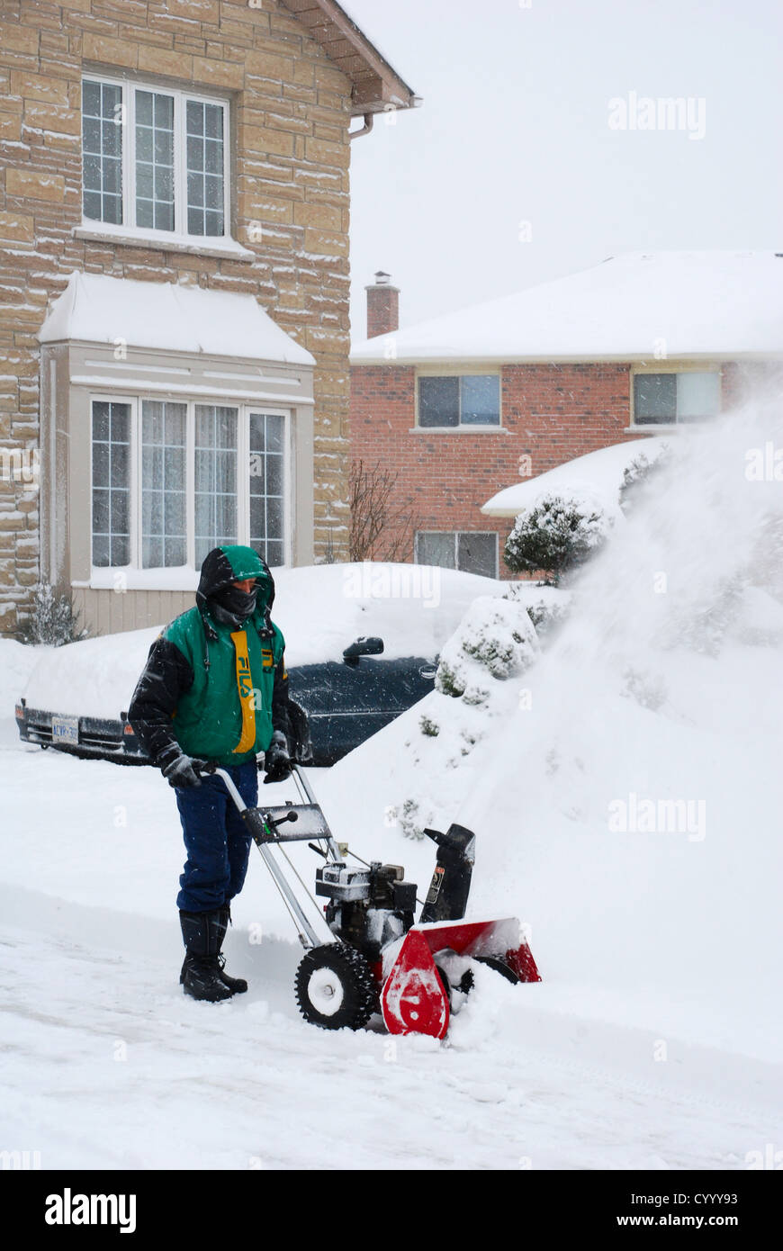 Man clearing snow from driveway Stock Photo - Alamy Man clearing snow from driveway Stock Photo - Alamy