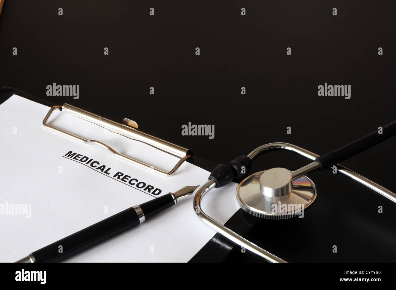 medical record clipboard and stethoscope showing health or medicine ...