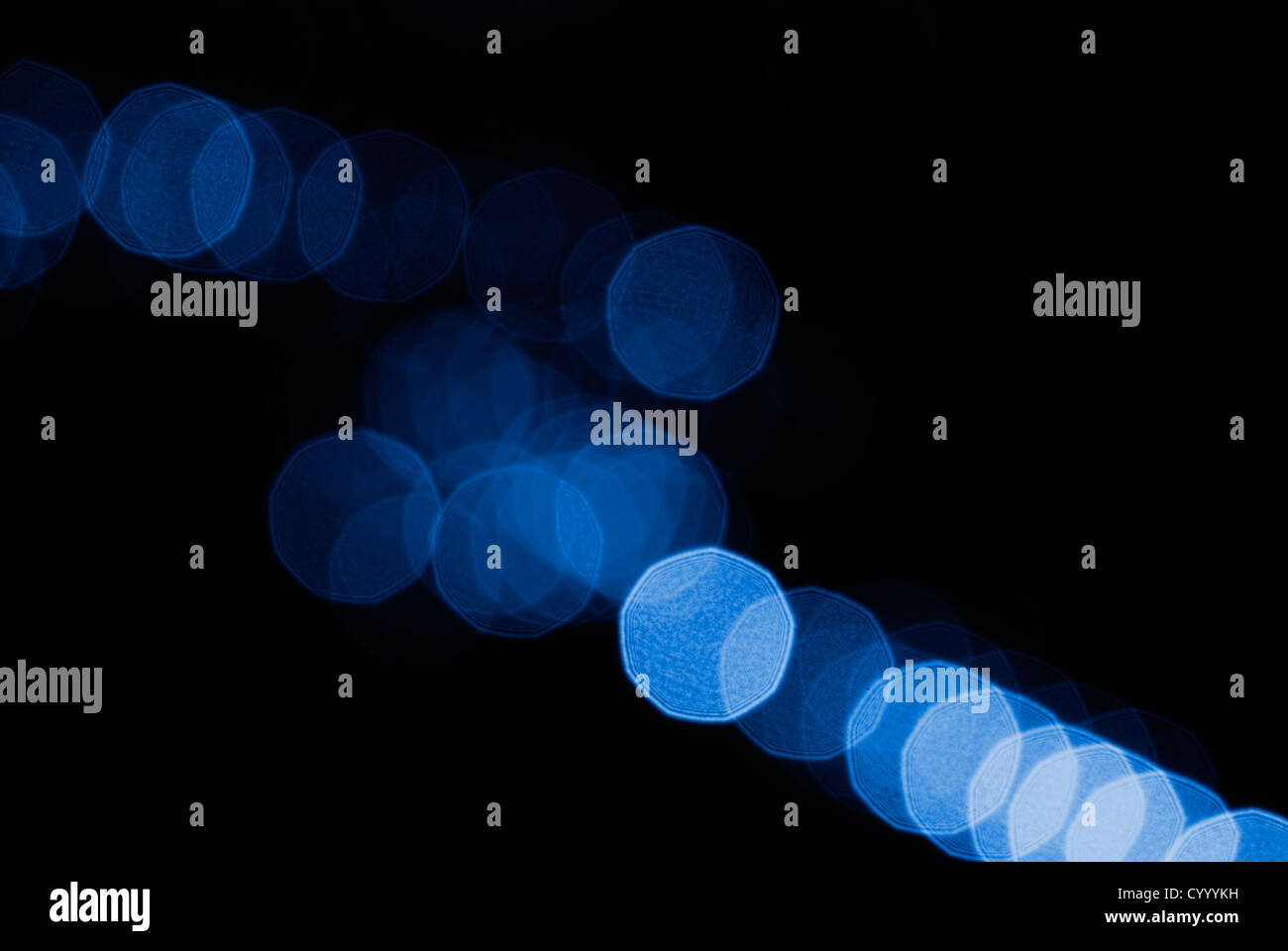 Beautiful blue blurred spot light arrange in a line Stock Photo - Alamy