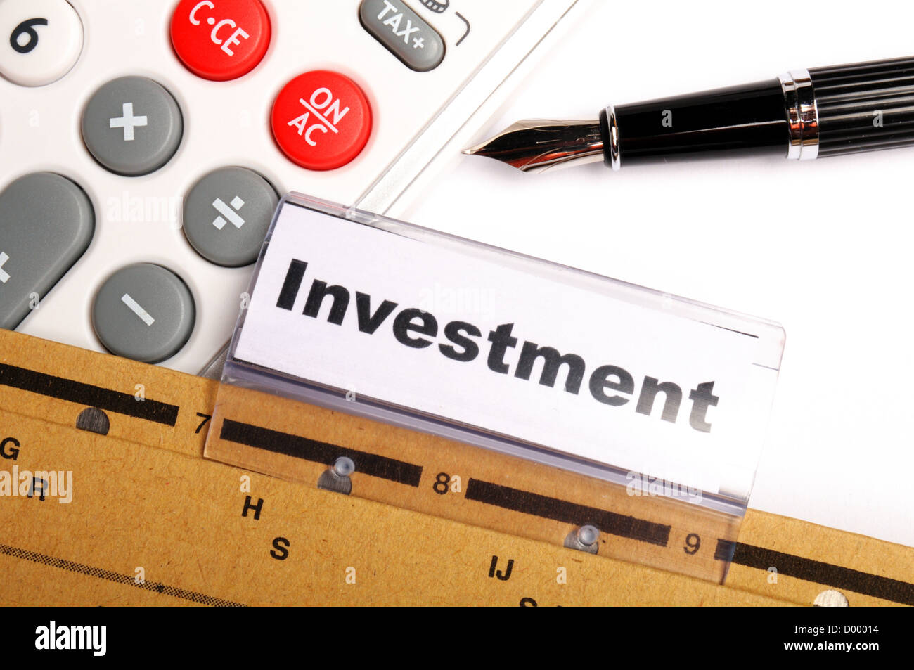 investment word on business folder showing financial success concept ...