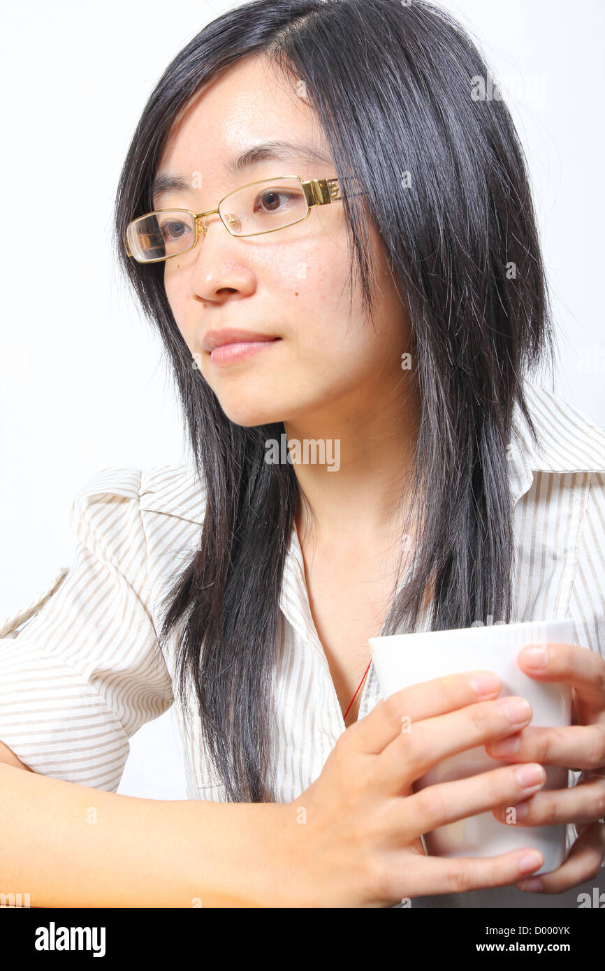 Chinese businesswoman drinking coffee Stock Photo - Alamy