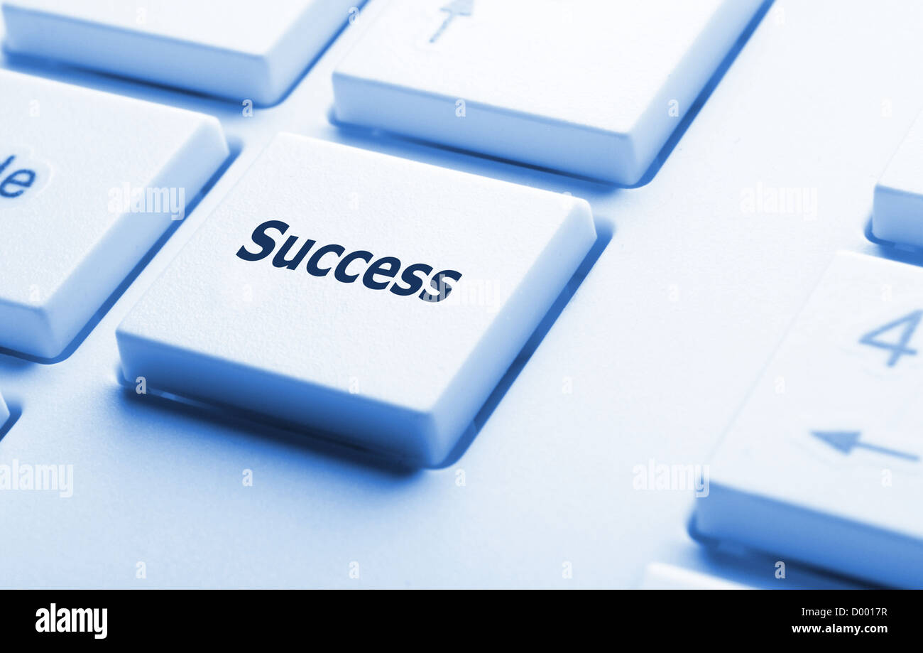 success in business concept with key on computer keyboard Stock Photo ...