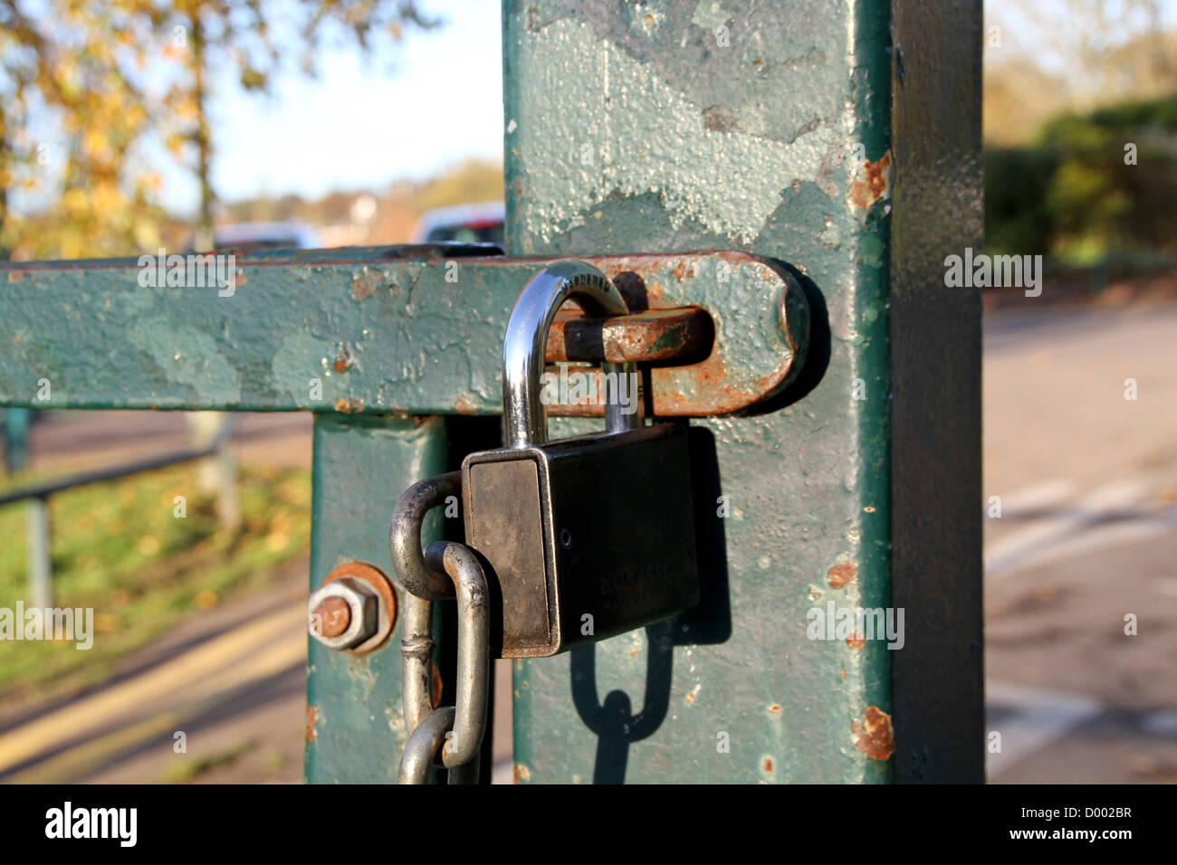 padlock on rusty metal gate Stock Photo - Alamy