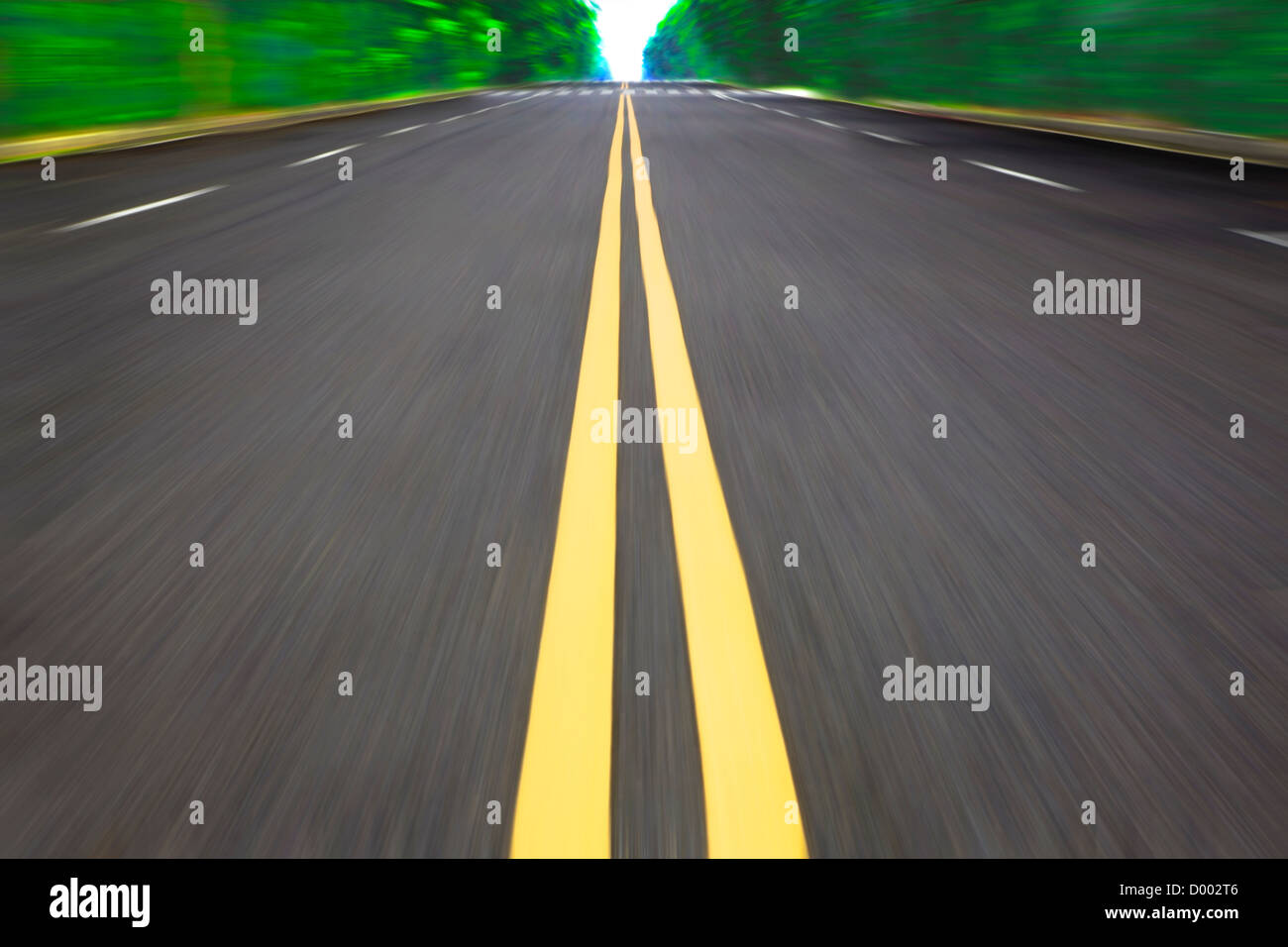 High speed driving car on the empty road Stock Photo - Alamy