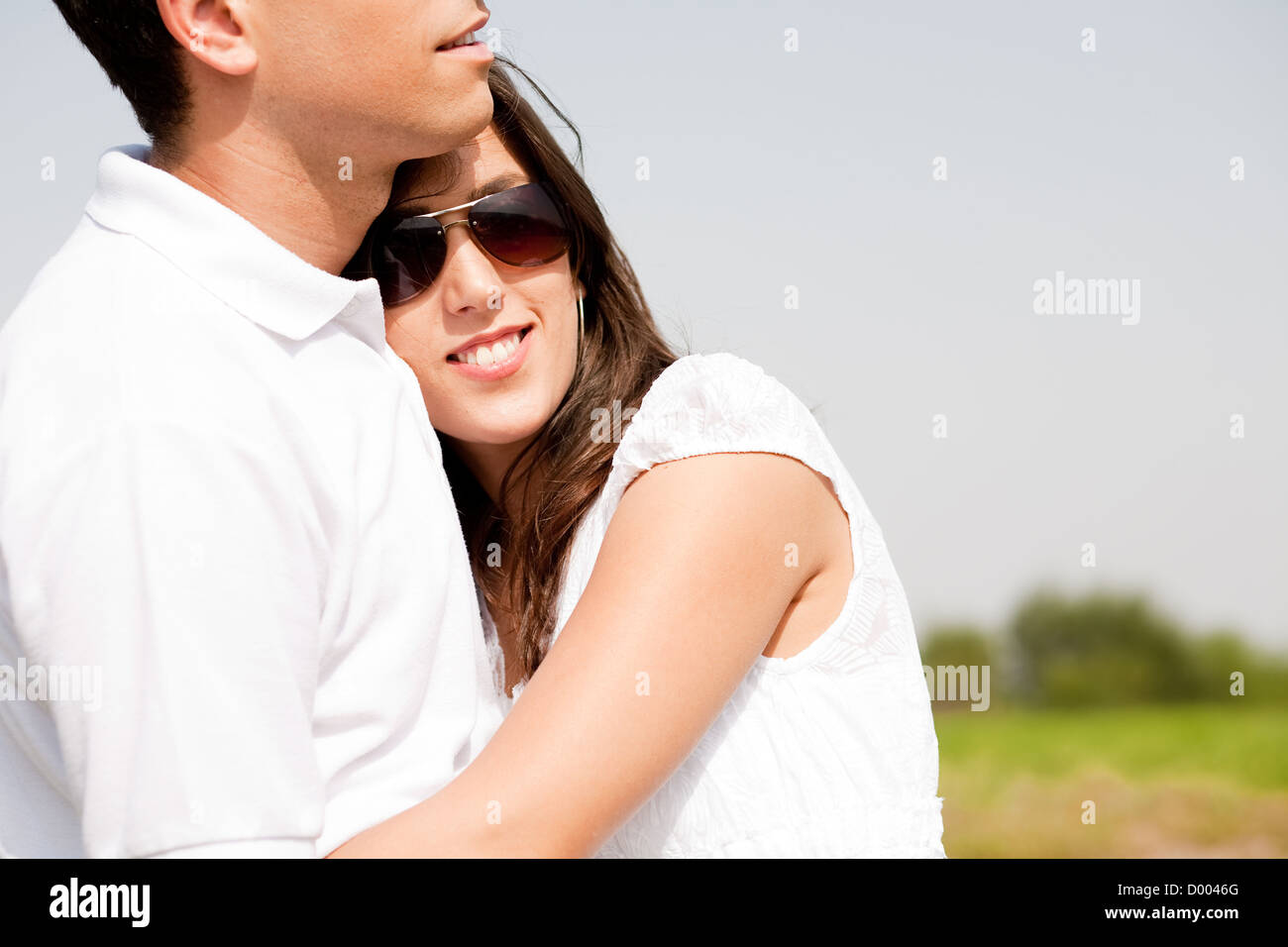 Closeup Portrait Of A Cute Couple Hugging , Focus On Female Stock Photo ...