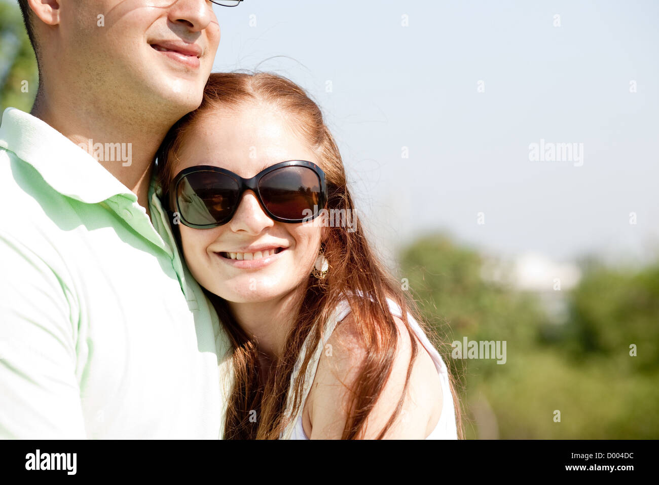 Closeup Portrait Of A Cute Couple Hugging , Focus On Female Stock Photo ...