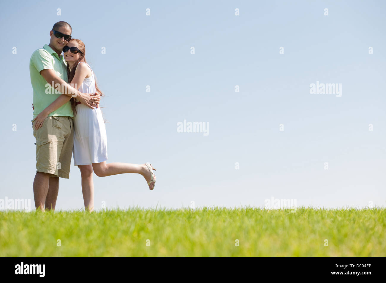 A Cheerful young couple having A good time on the park Stock Photo - Alamy