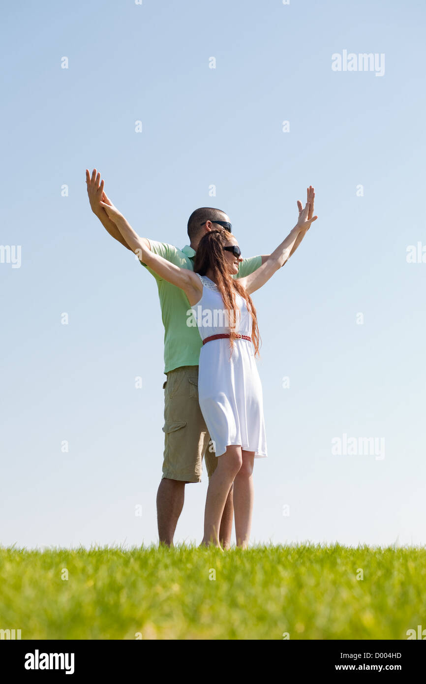 young Couple Stretching Their Hands Together, outdoor Stock Photo - Alamy