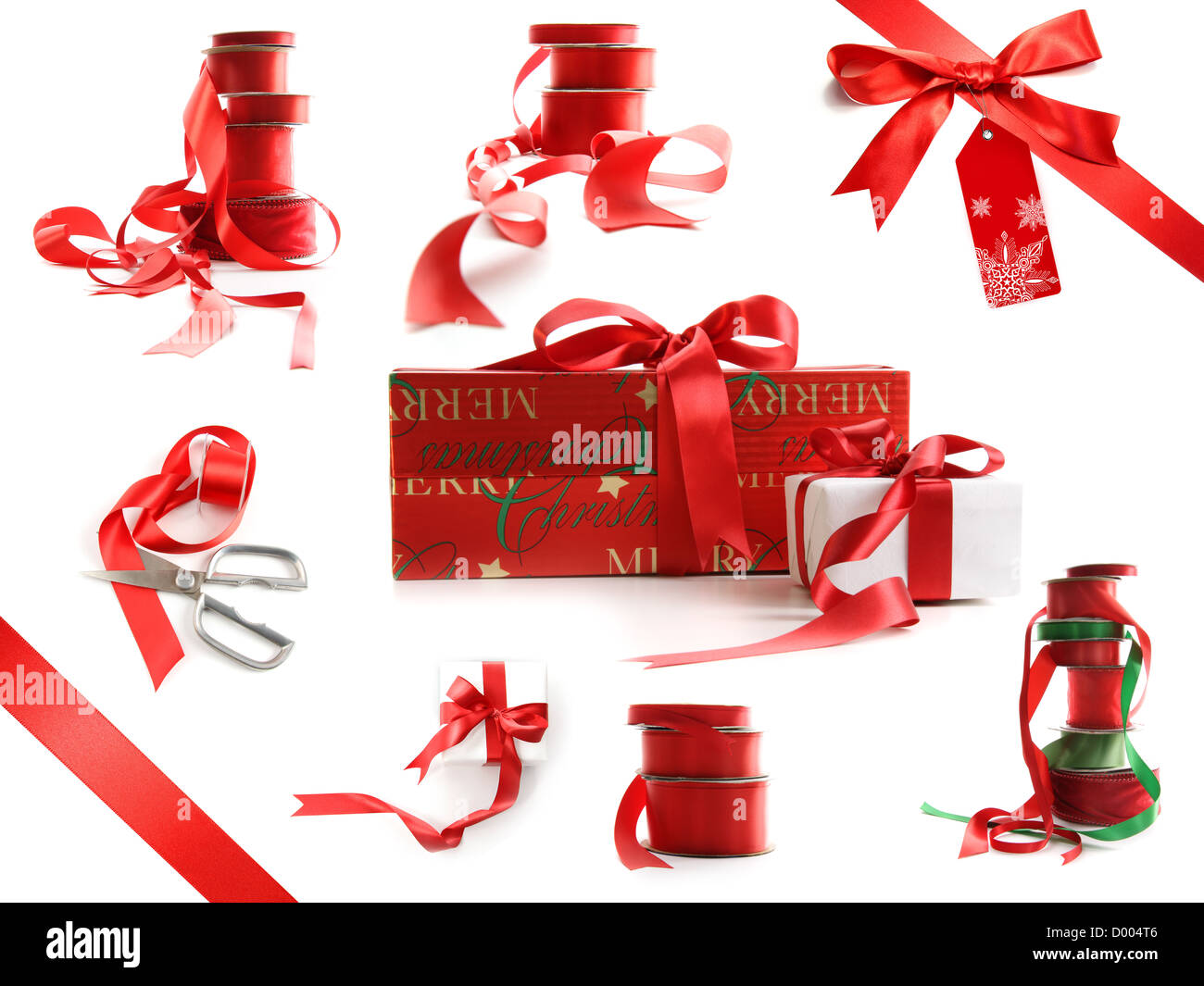 Different sizes of red ribbons and gift wrapped boxes isolated on white ...
