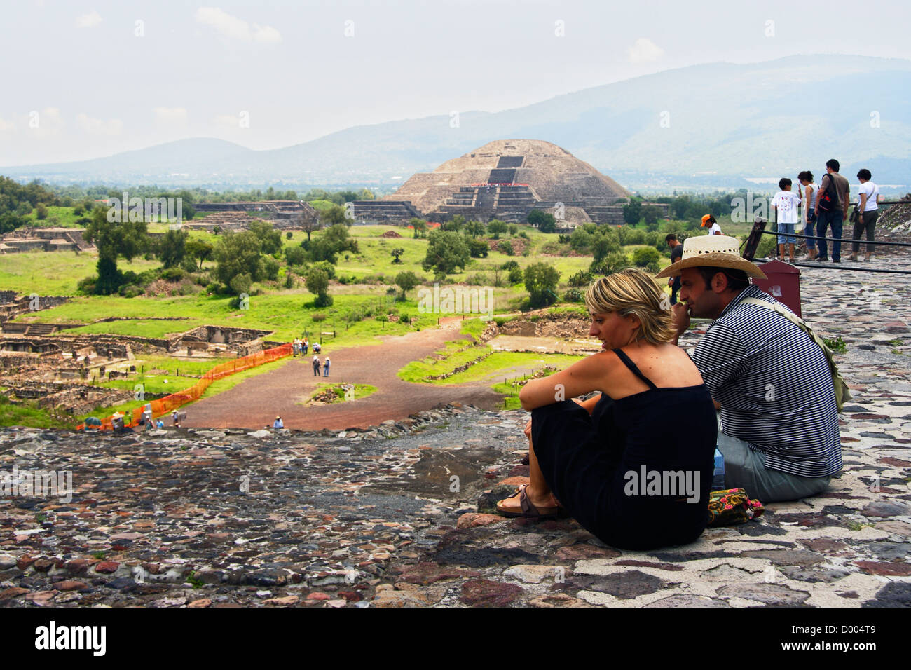 Couple of tourists on top of the Teotihuacan Sun Pyramid with Moon ...