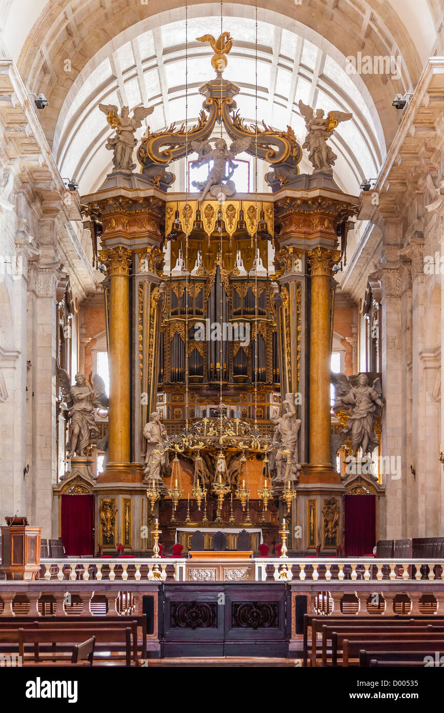 Baroque altar under a baldachin in the Sao Vicente de Fora Monastery ...