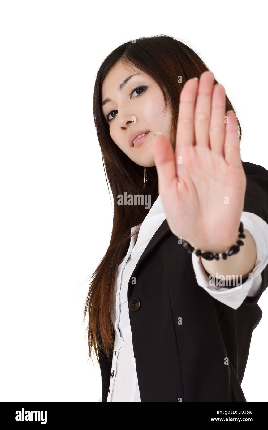Cool business woman showing reject gesture over white Stock Photo - Alamy