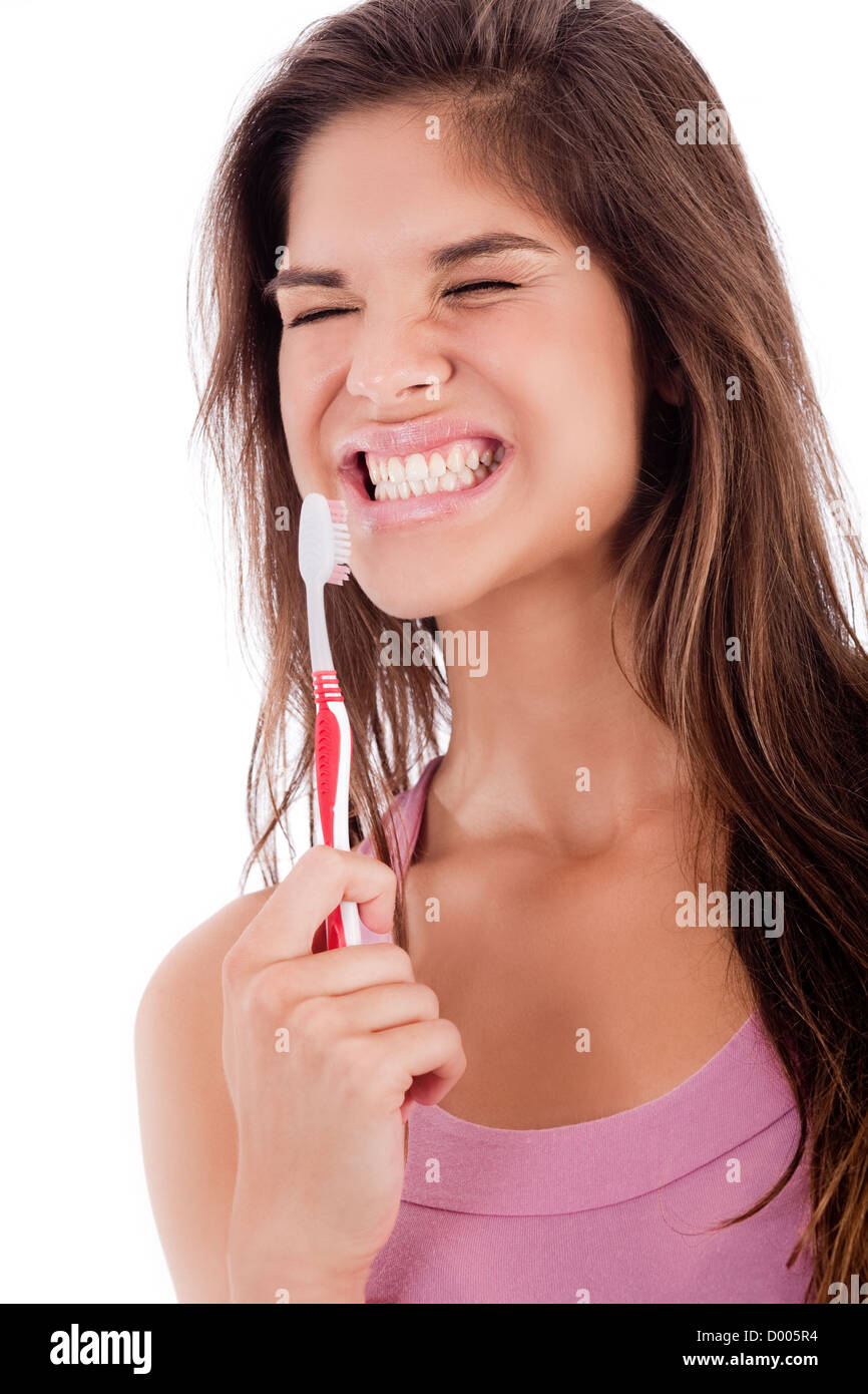 advertisement of cute girl brushing her teeth on isolated white ...
