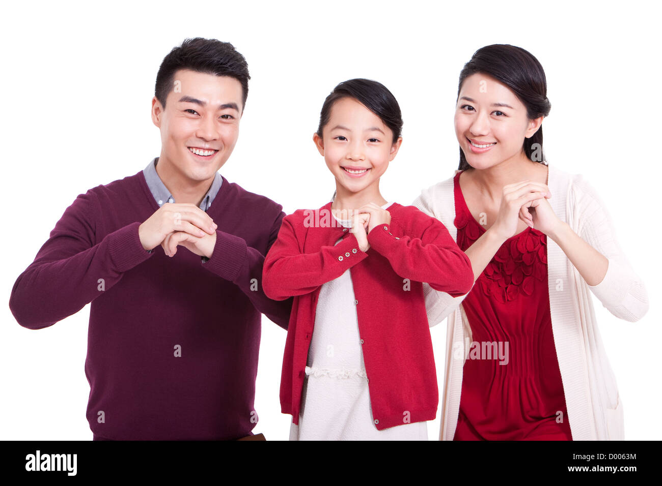 Cheerful family congratulating for Chinese New Year Stock Photo - Alamy