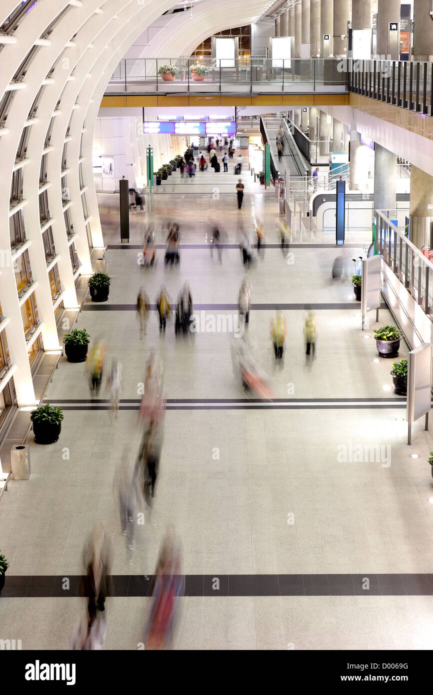 people moving blur in corridor Stock Photo - Alamy