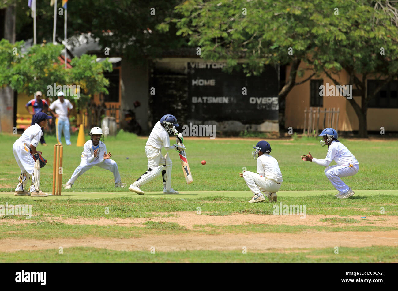 Schoolboys playing inter school cricket match in Tissamaharama, Sri ...