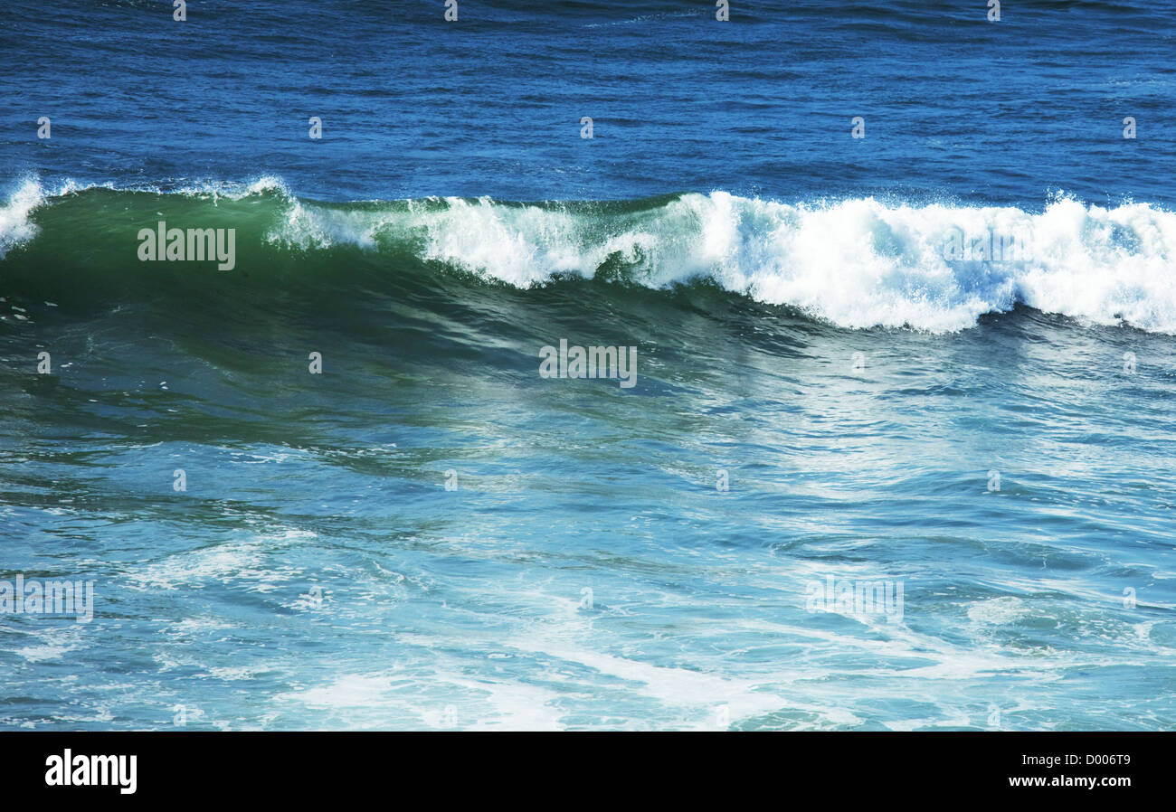 Wave on the beach Stock Photo - Alamy
