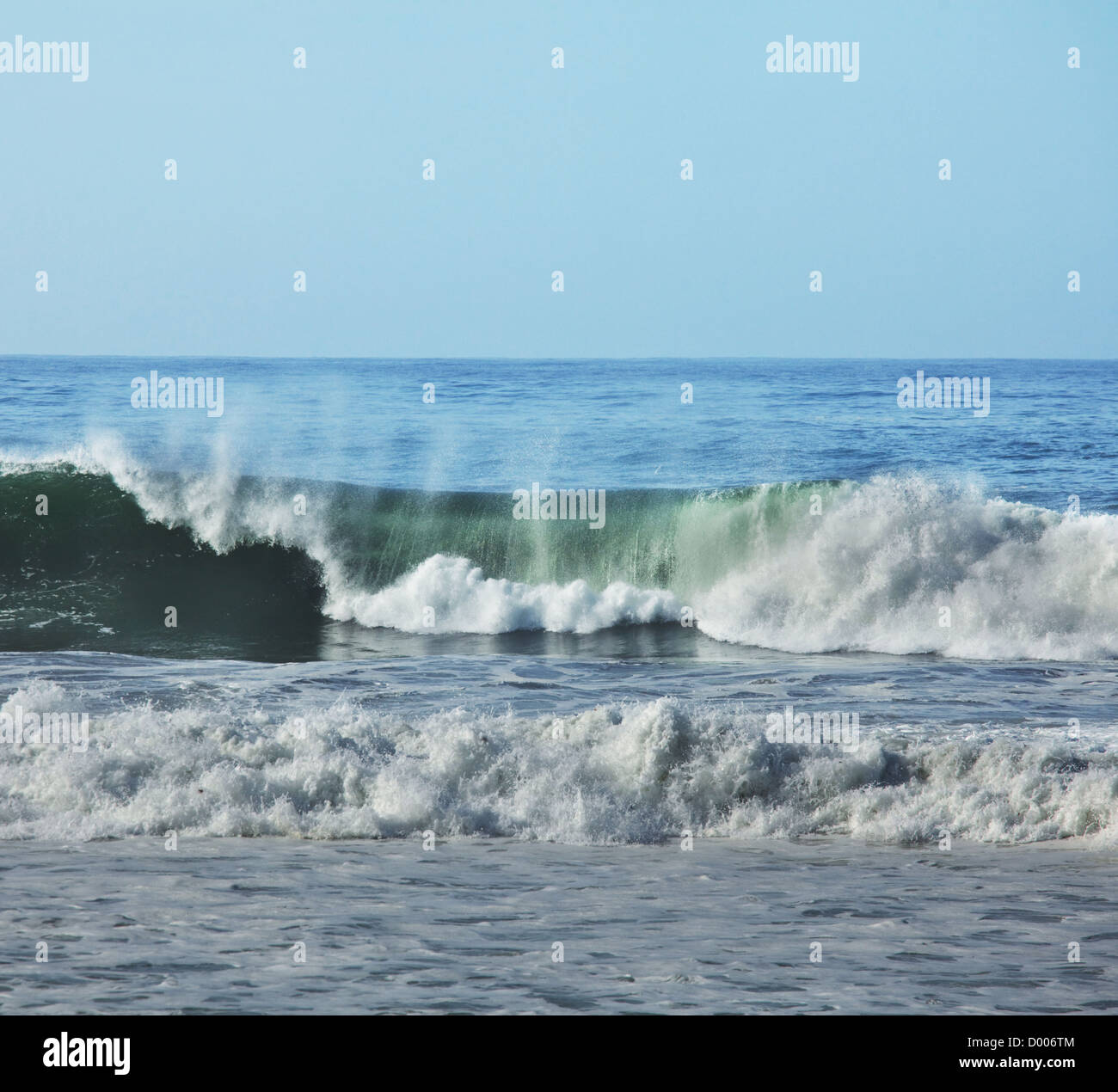 Wave on the beach Stock Photo - Alamy