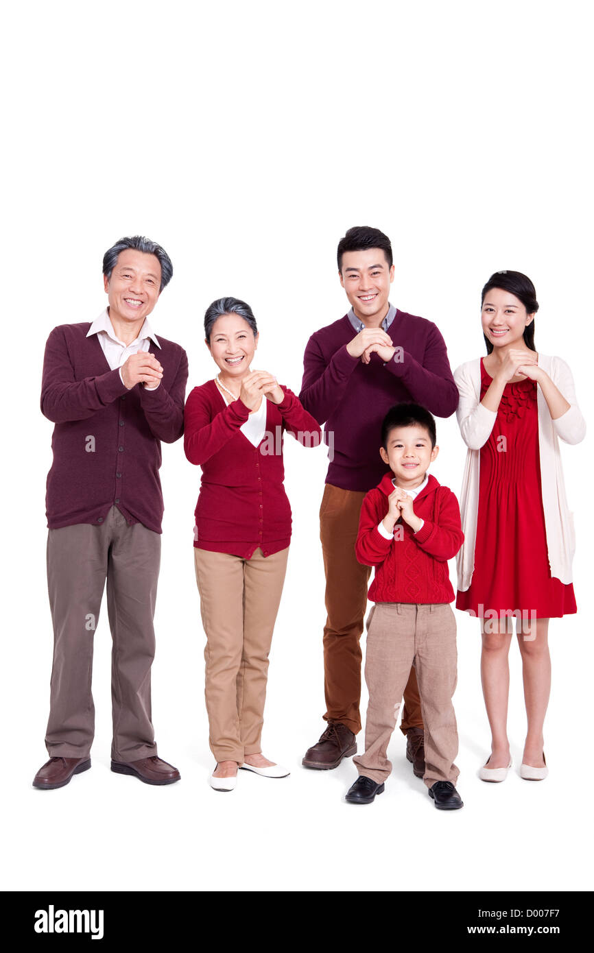 Cheerful family greeting for Chinese New Year Stock Photo - Alamy