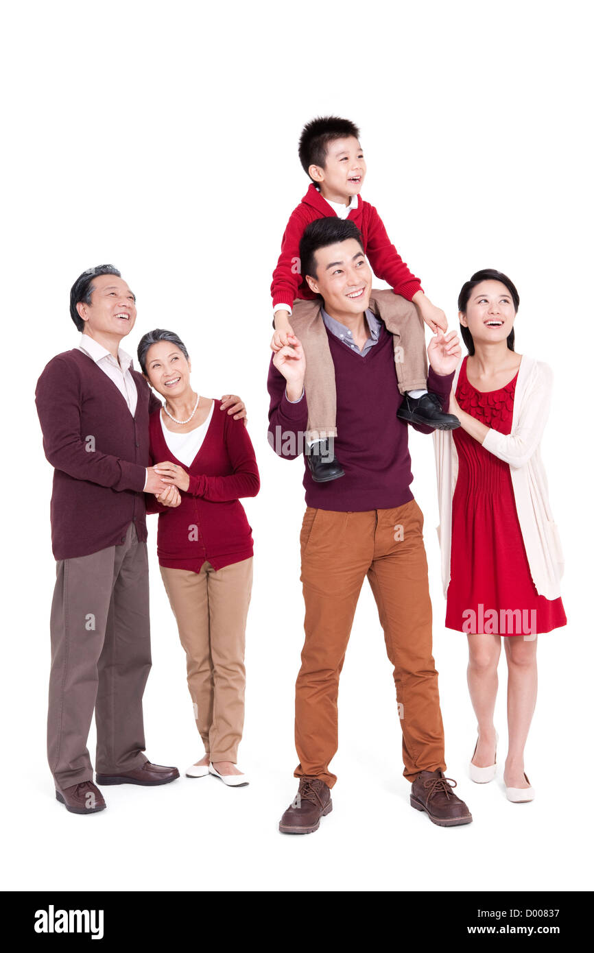 Happy family looking at view Stock Photo - Alamy
