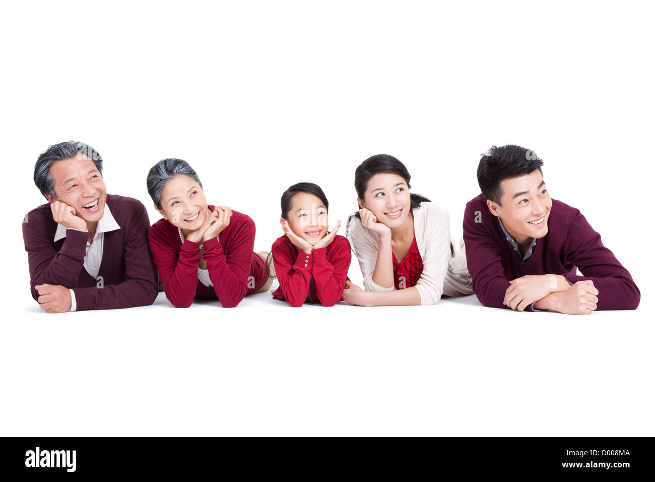 Happy family looking at view Stock Photo - Alamy