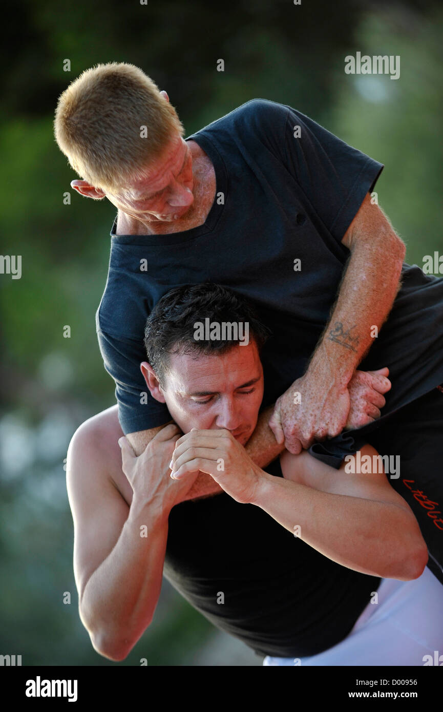 Two men fighting martial arts hi-res stock photography and images - Alamy