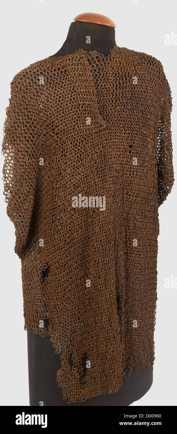 An Japanese okimono, late Edo/early Meiji period. Ivory. A standing ...