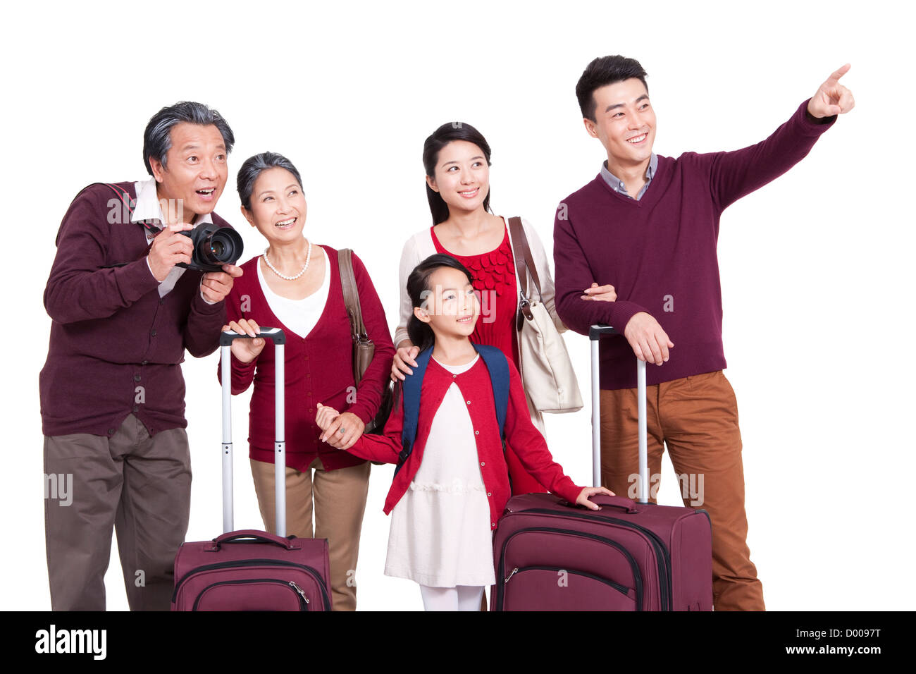 Joyful family going for a vacation Stock Photo - Alamy