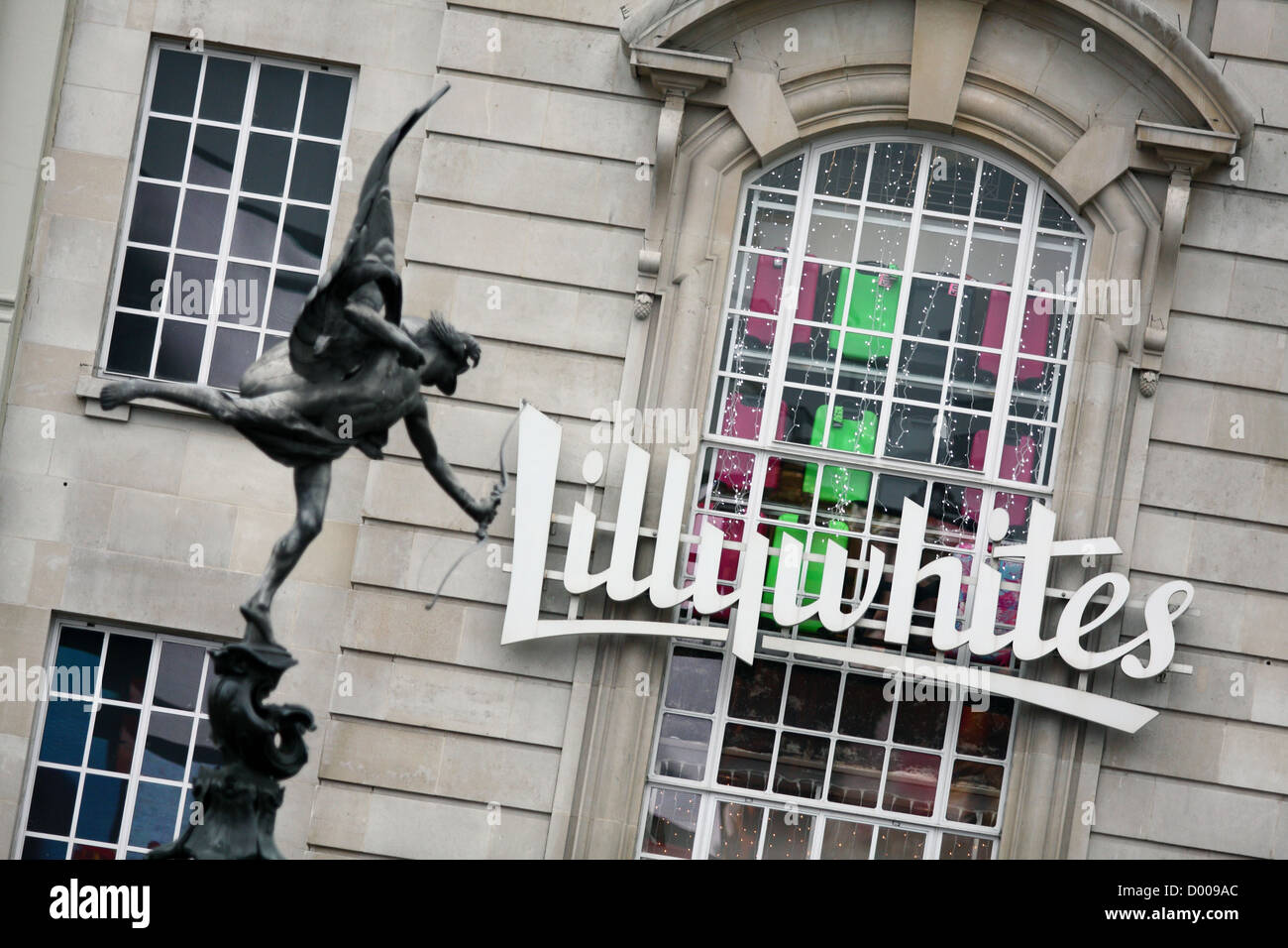 The statue of Eros in Piccadilly, with the Lillywhites building in the ...