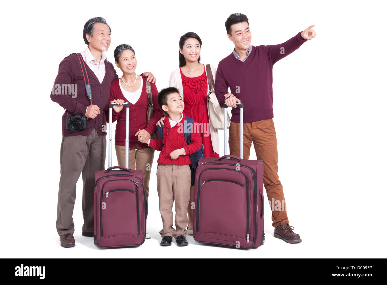 Joyful family going for a vacation Stock Photo - Alamy