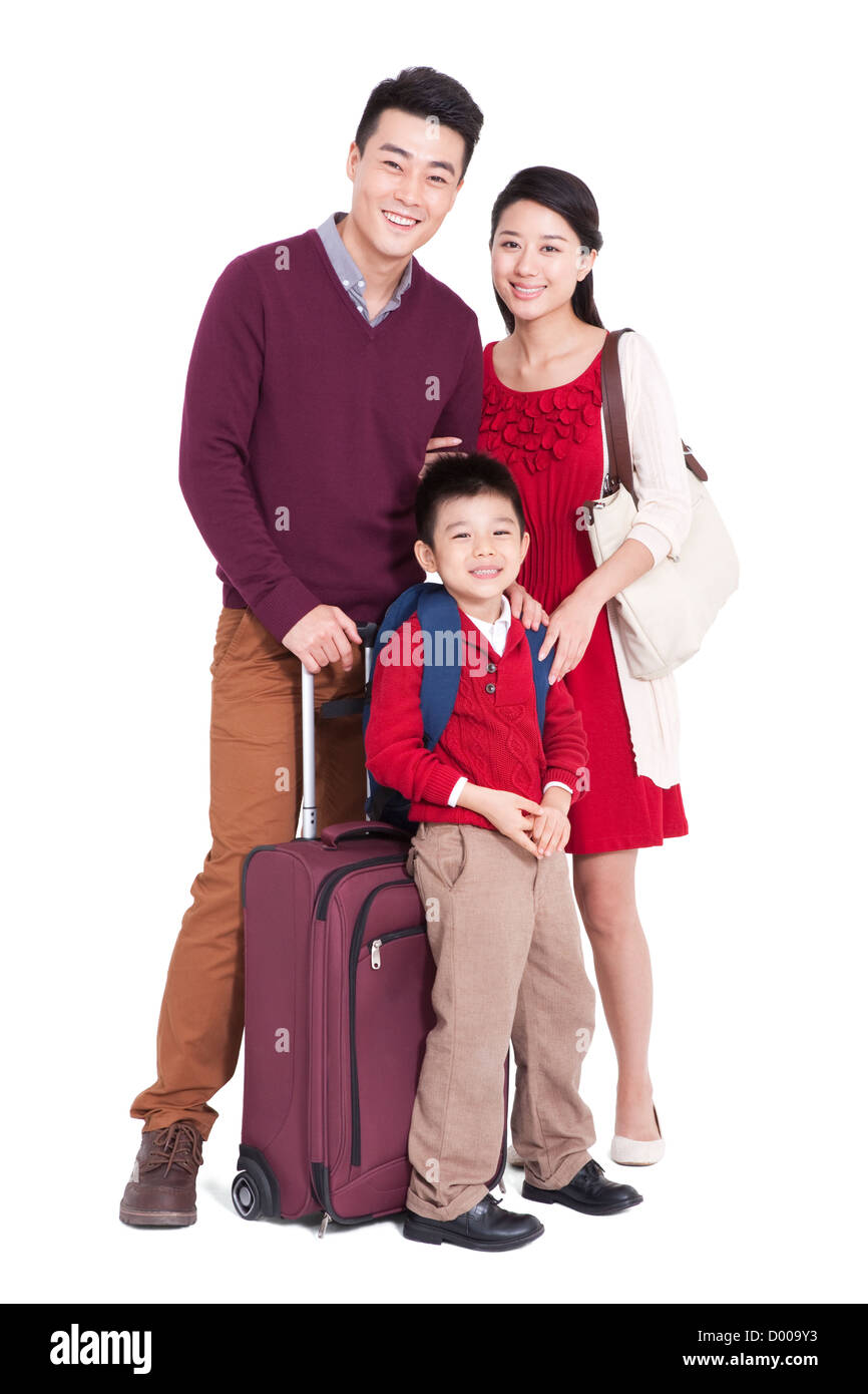 Joyful family going for a vacation Stock Photo - Alamy