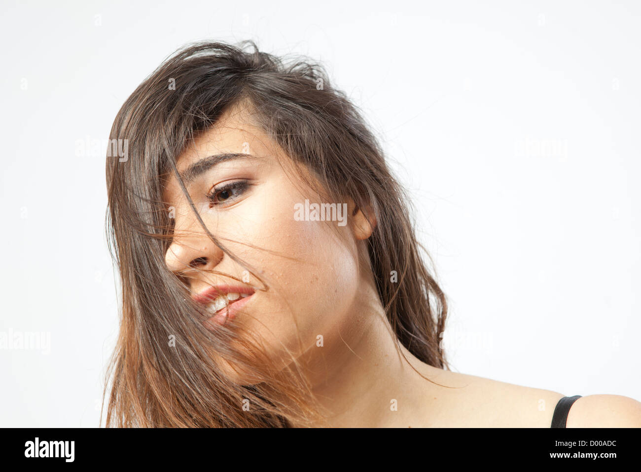 real beautiful young girl playing with her hair Stock Photo - Alamy