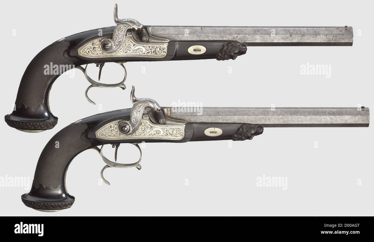 A cased pair of percussion pistols,Liège,circa 1830. Octagonal barrels ...