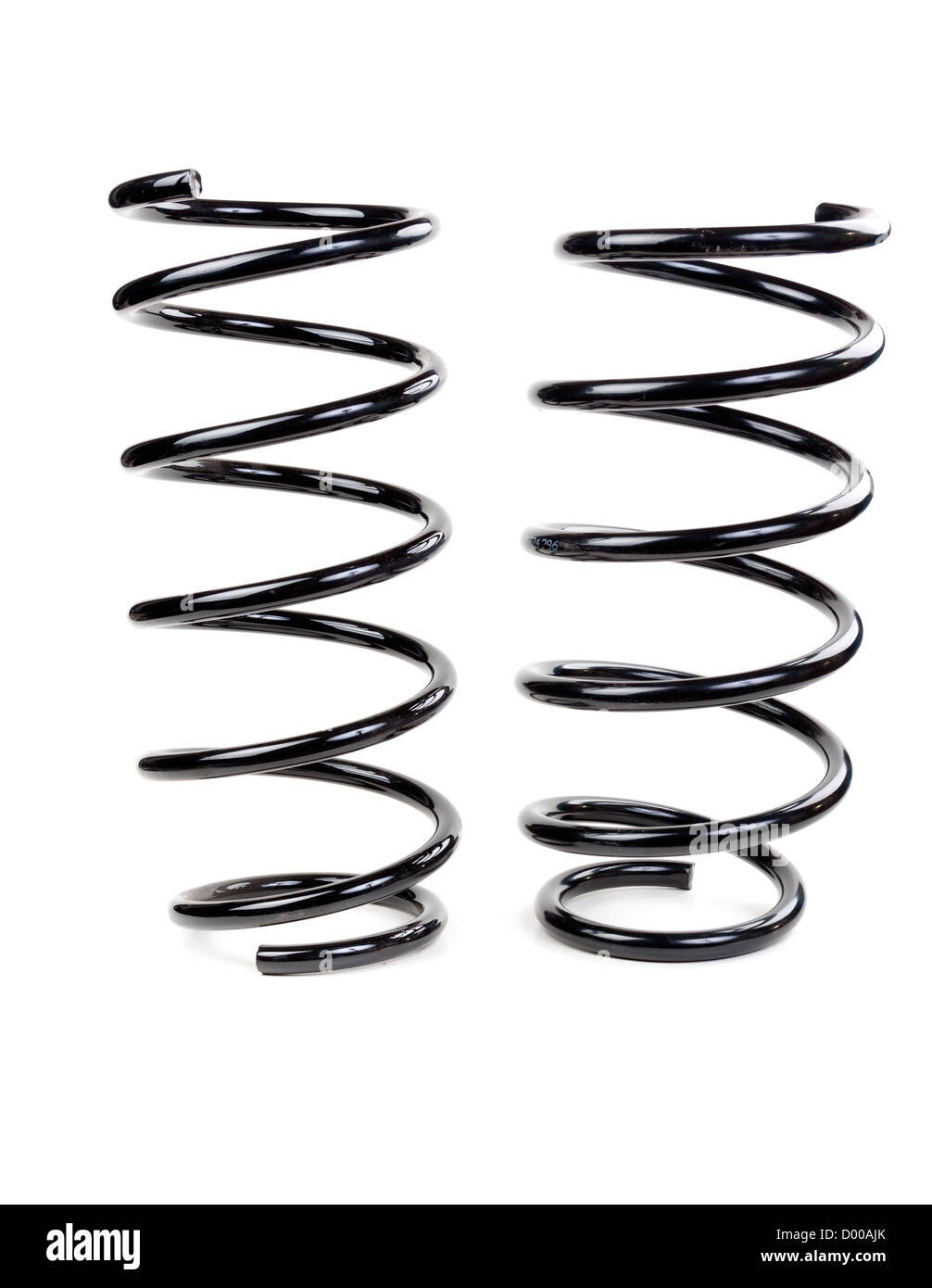 Pair of car spring isolated on white background Stock Photo - Alamy