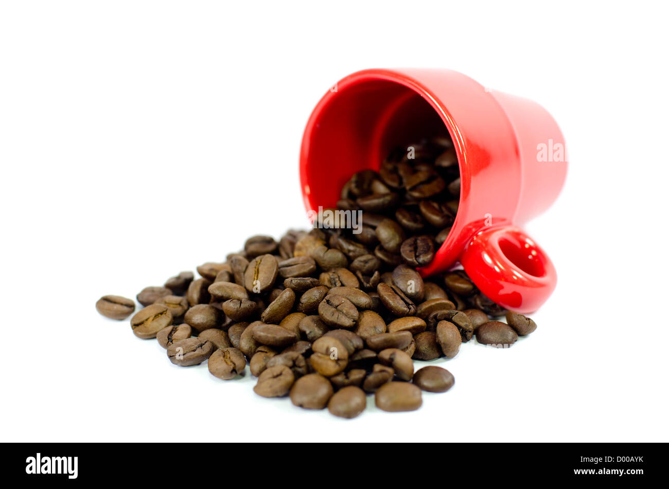 a cup of spilled coffee beans Stock Photo - Alamy