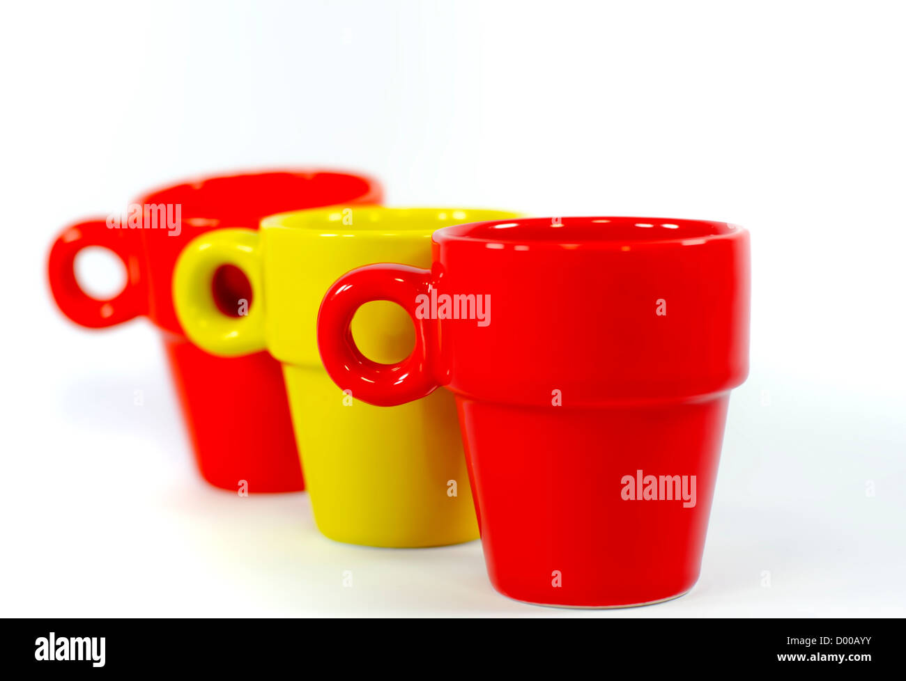 three colored coffee cuo Stock Photo - Alamy