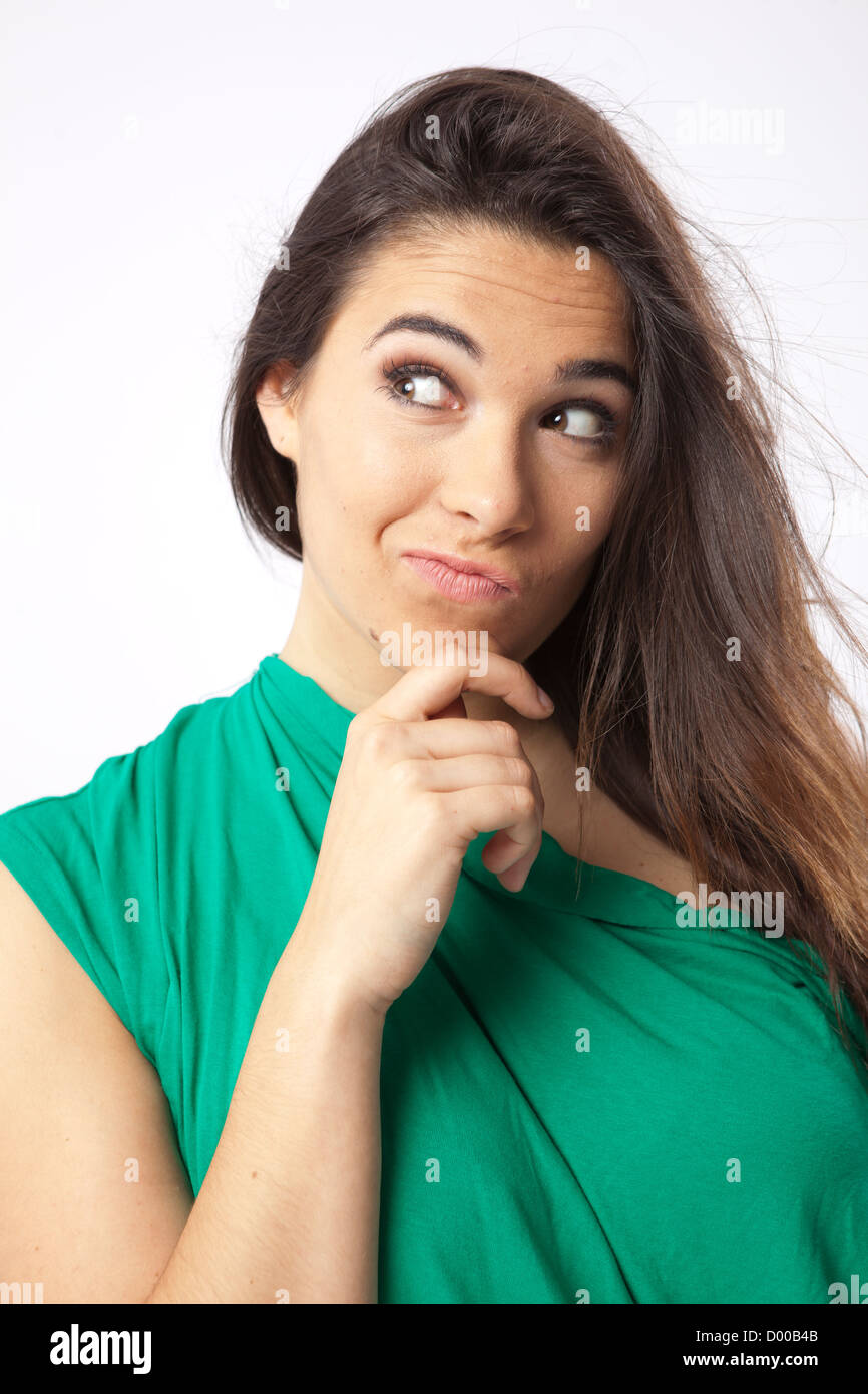 real beautiful young girl thinking expression on wihte Stock Photo - Alamy