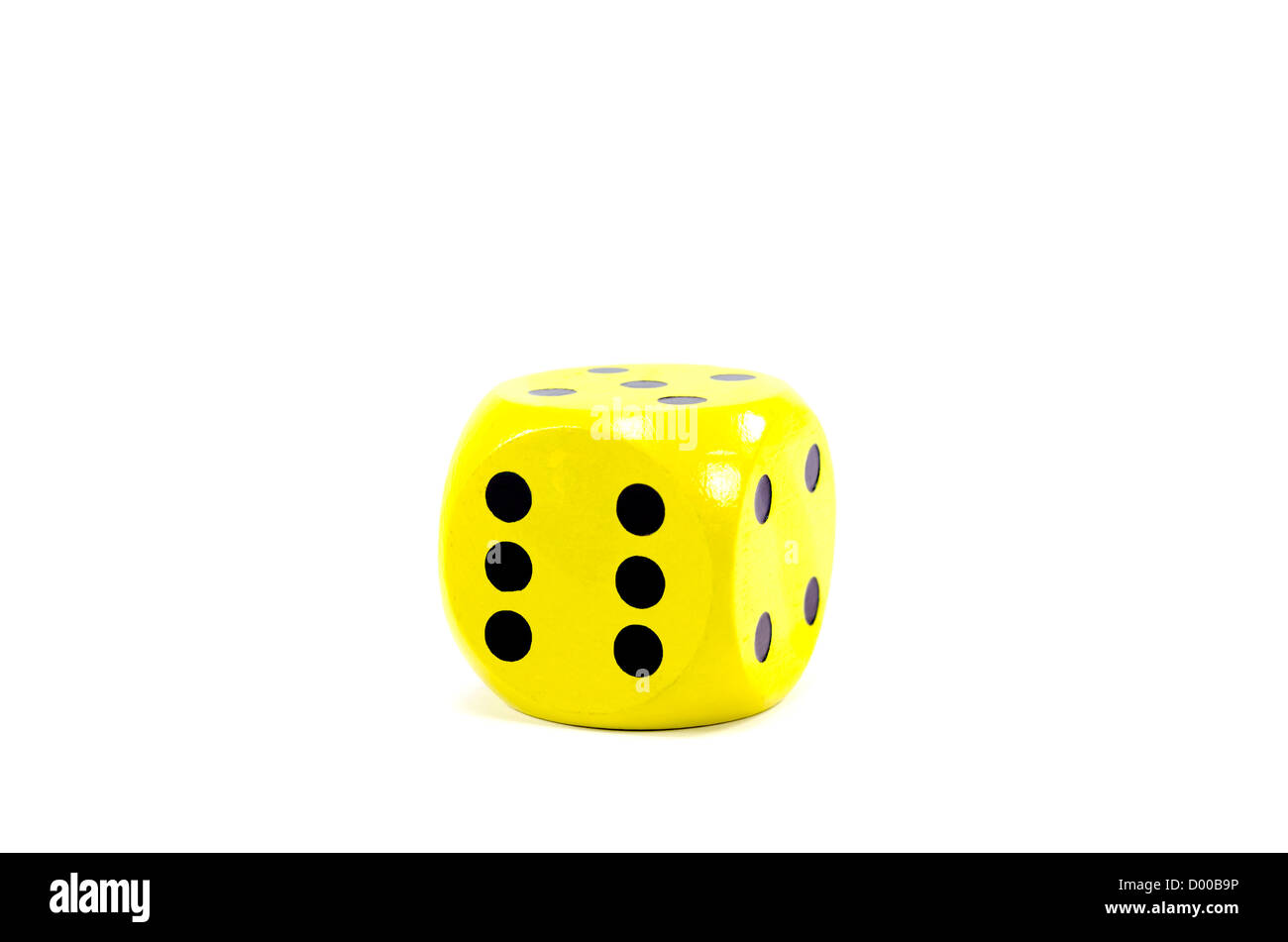 yellow die with the number six Stock Photo - Alamy