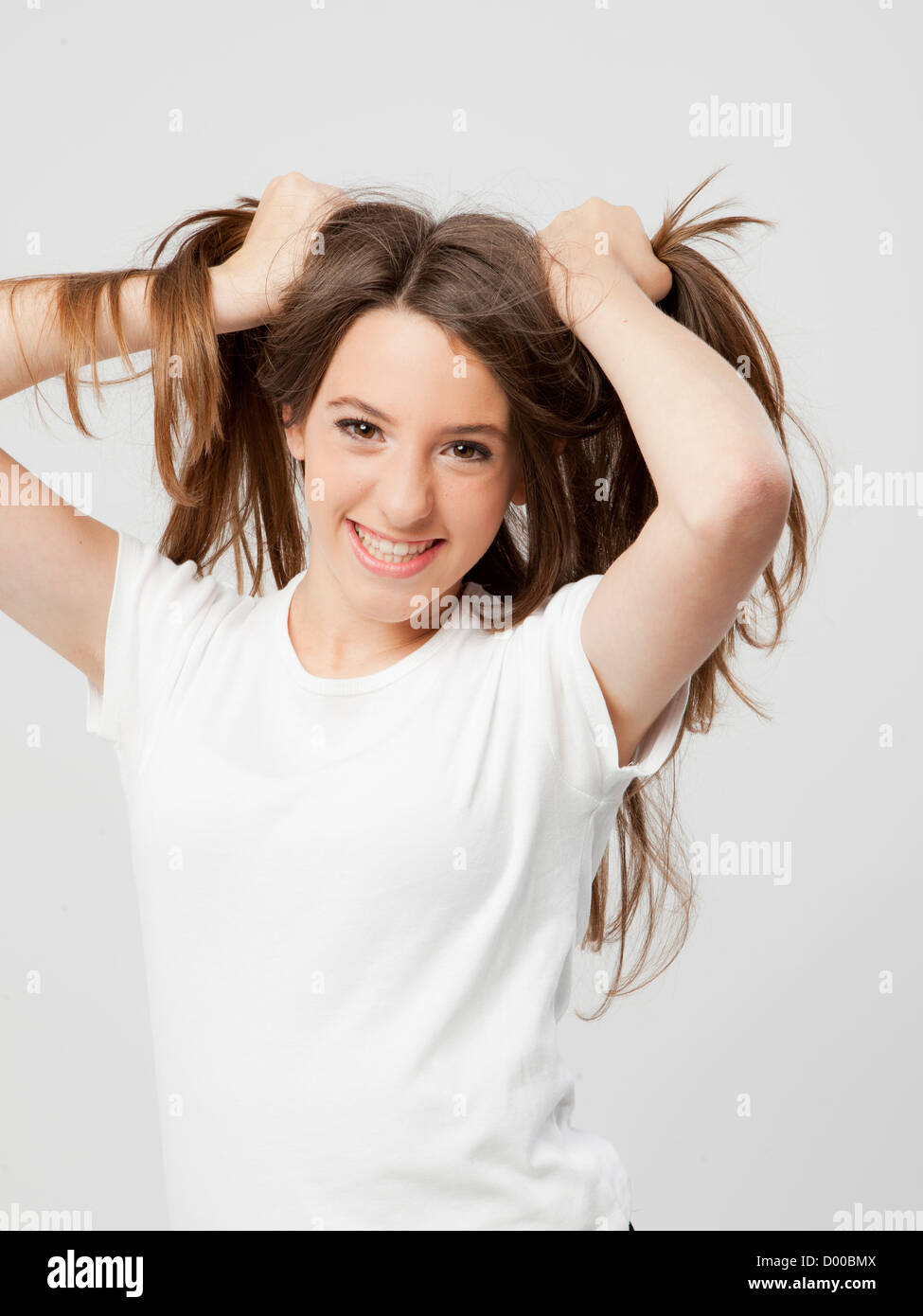 funny expression and gesture of a real young girl Stock Photo - Alamy
