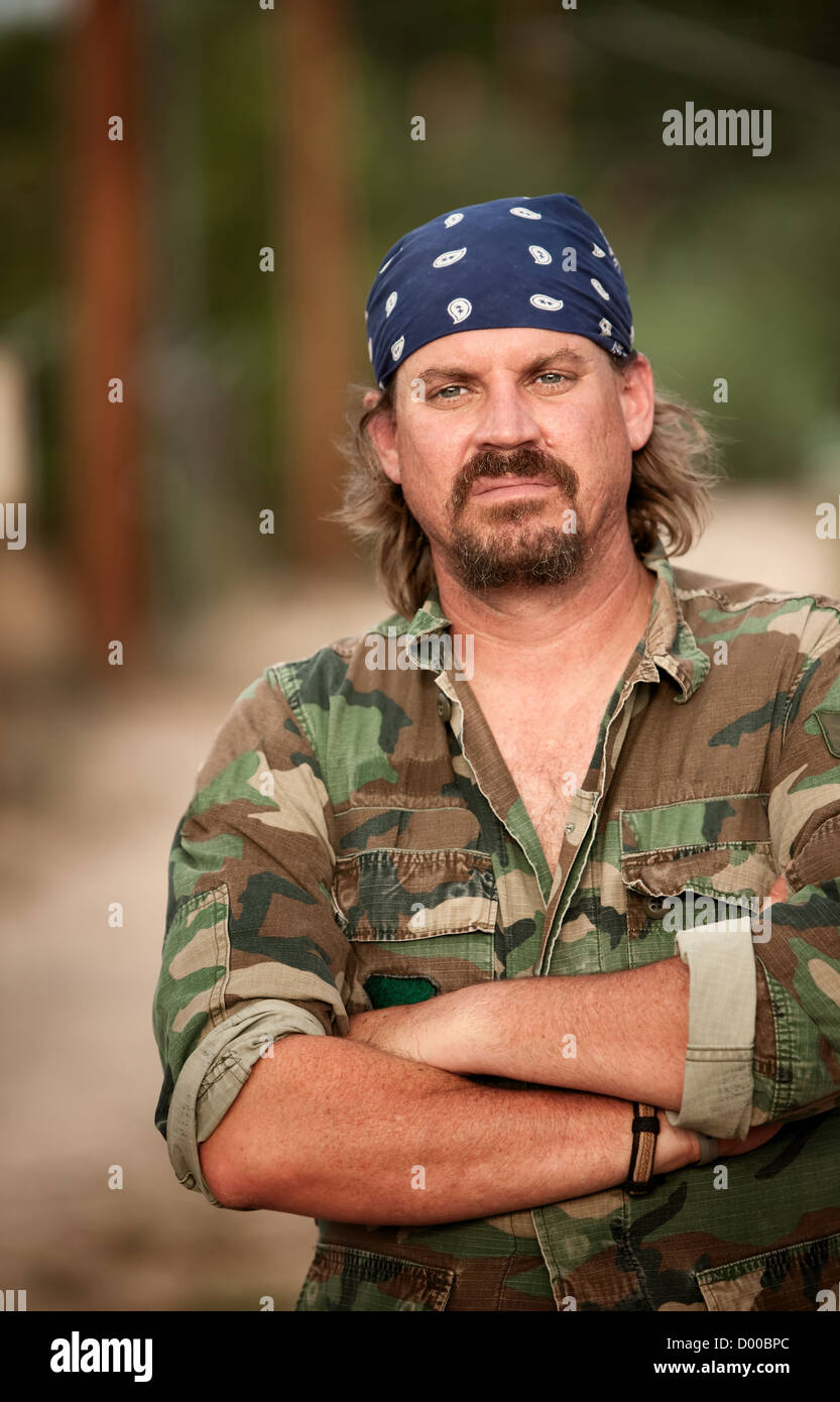 Portrait of rugged man in camoflauge jacket Stock Photo - Alamy
