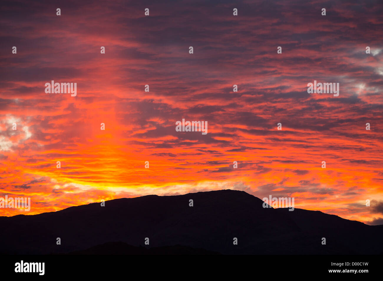 Dark red orange sunset glow red clouds hi-res stock photography and ...