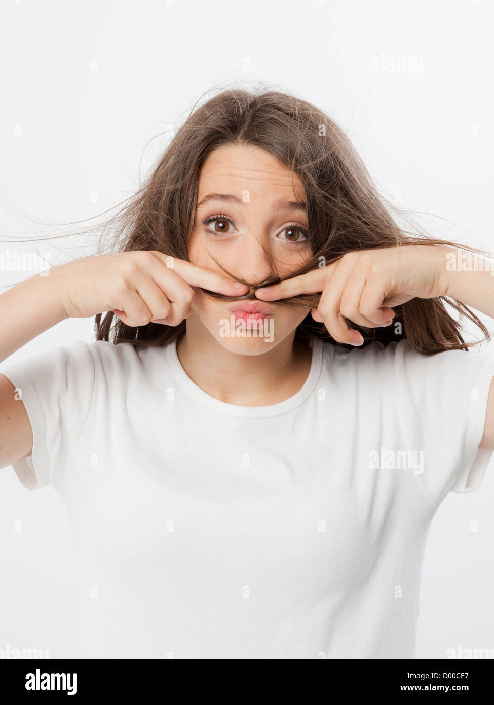 funny expression and gesture of a real young girl Stock Photo - Alamy